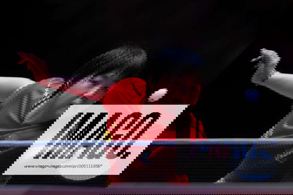 MACAO, Kuai Man hits a return during the women s singles quarterfinal ...