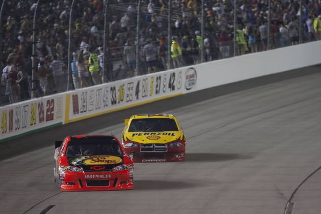 Richmond, VA - SEP 10, 2011: Jamie McMurray races off the front stretch ...