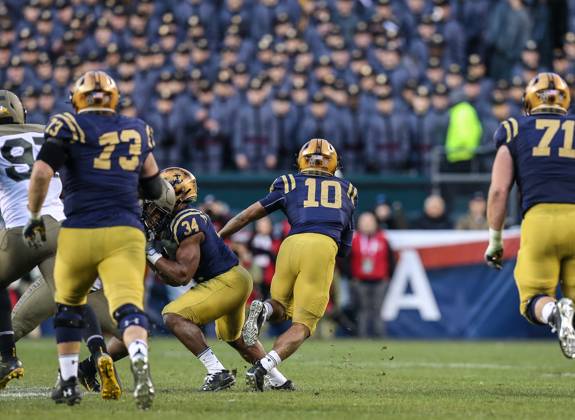 : Navy Midshipmen quarterback Malcolm Perry runs for one of his 29 ...