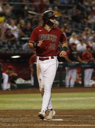 : Jake McCarthy of the Arizona Diamondbacks gets hit by pitch in the ...