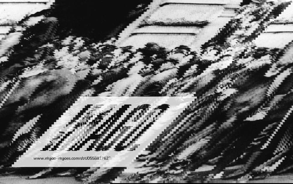 The scene outside a Shanghai bank as mounted police try to keep back ...