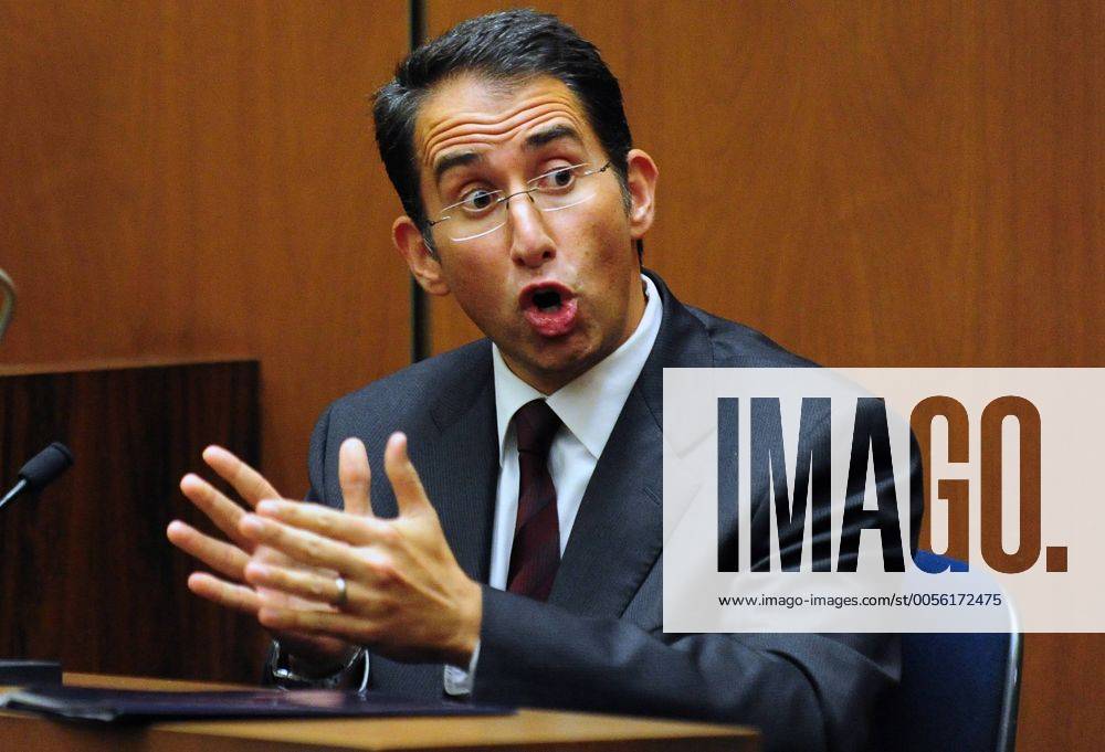 Dr. Nader Kamangar gestures from the witness stand during Dr. Conrad ...