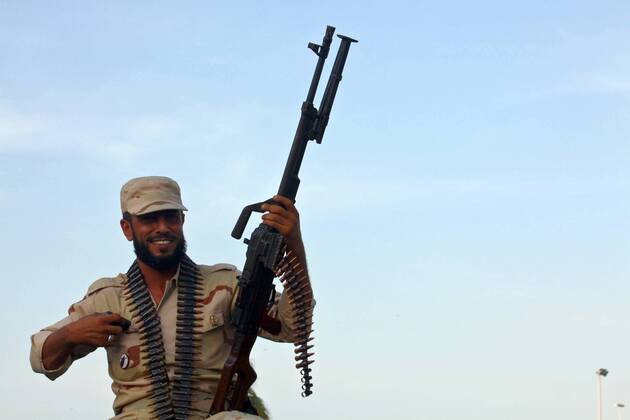Libyan National Transitional Council (NTC) fighters celebrate in the ...