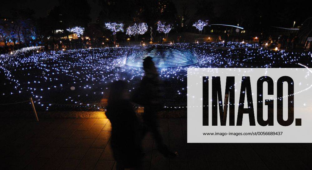 TOKYO, Dec. 12, 2011 People pass the decorations made for the ...