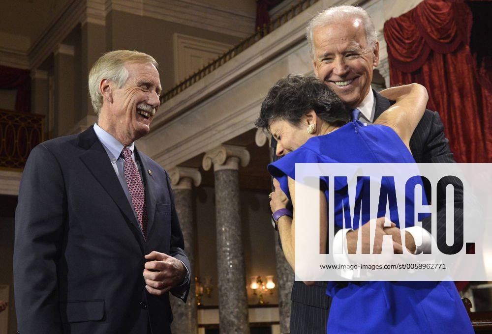 Newly-elected Sen. Angus King, Jr., watches as his wife Mary Herman is ...