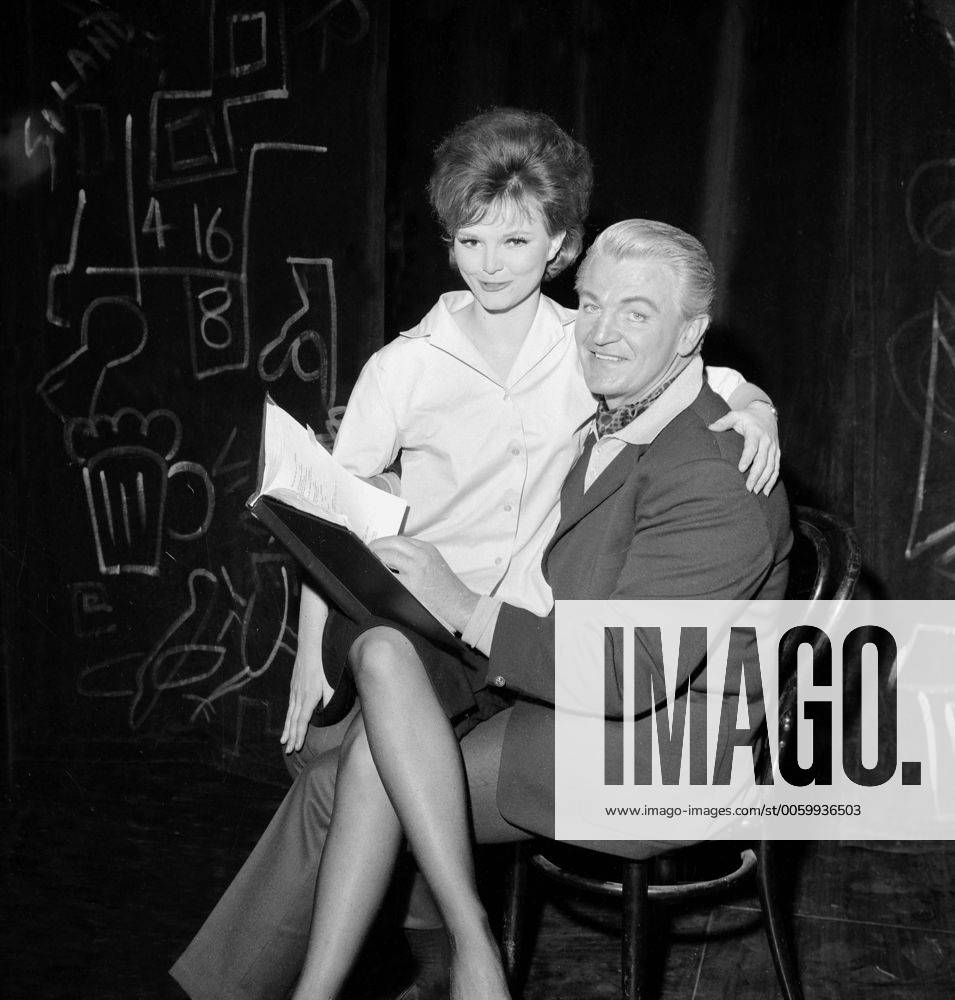 South African actress , Erica Rogers , perches herself on the knee of ...