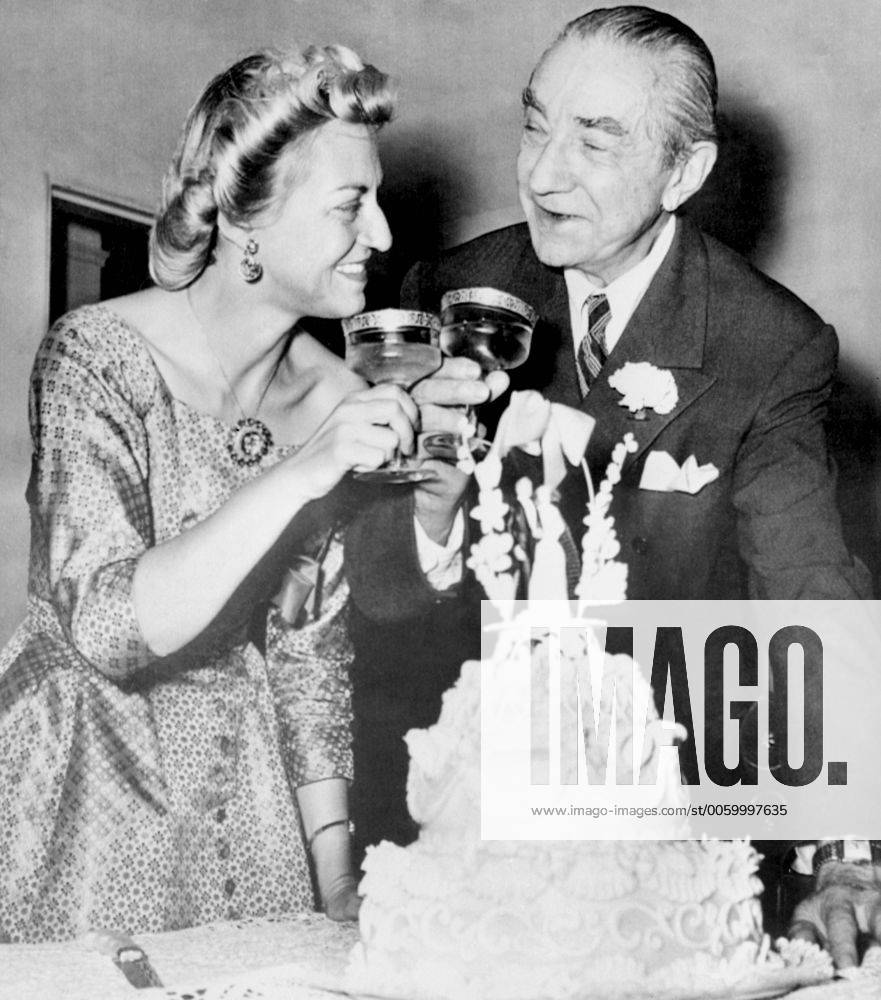 Bela Lugosi, 74 drinks a toast with his bride, Hope Lininger, 39, as ...