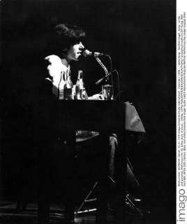 Donovan performing . Scottish singer, song - writer and guitarist. Well ...