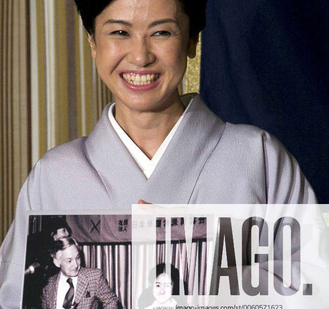 Actress Ayako Kobayashi shows a picture when she played a role of Oshin ...