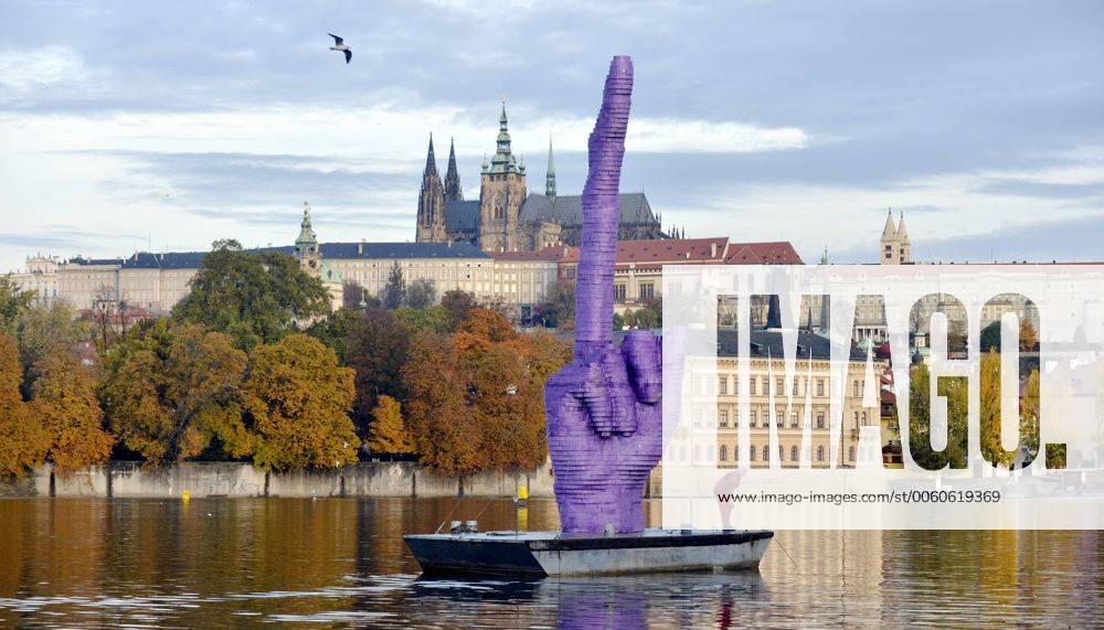 A ten-metre purple middle finger by sculptor David Cerny appeared this ...