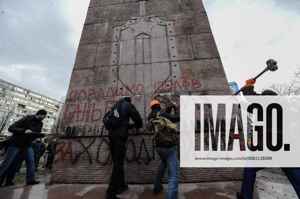BEIJING, Feb. 23, 2014 People demolish the letters on the Cheka ...