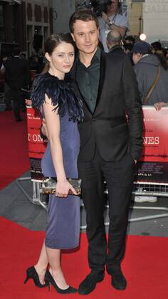 The Quiet Ones Premiere London. UK. Laurie Calvert and guest at the ...