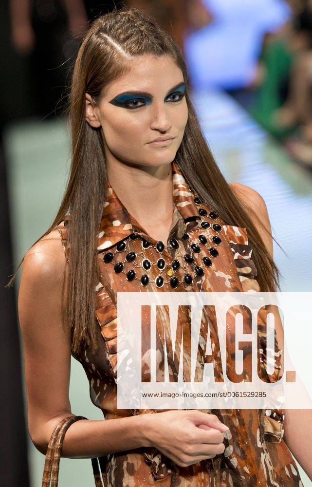 A model from Fabrizio de Castro fashions walks on the runway at the ...