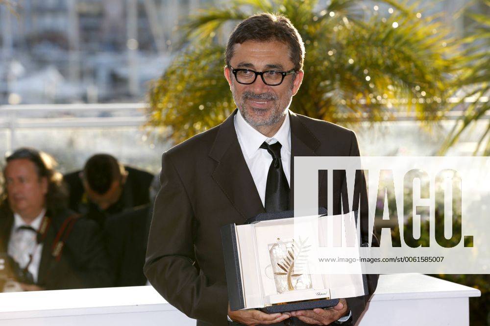 Director Nuri Bilge Ceylan poses with the Palme d Or for his film ...