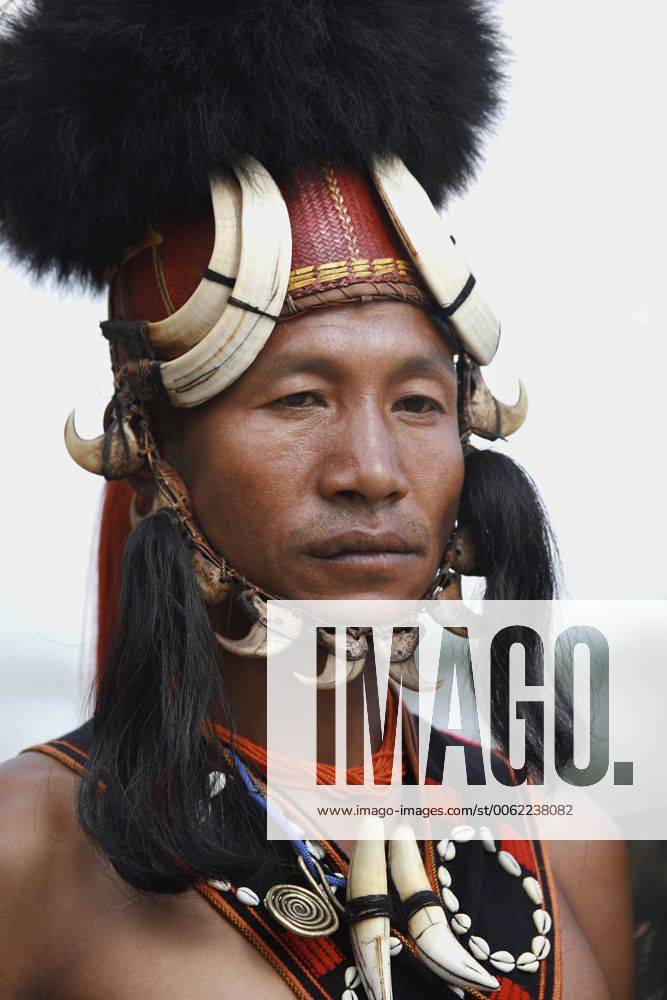 A Naga man in a traditional headgear from the Angami Tribe of Nagaland ...