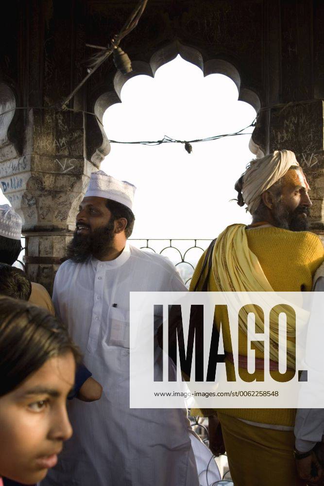 A Sadhu and a Molvi inside Jama Masjid, Delhi