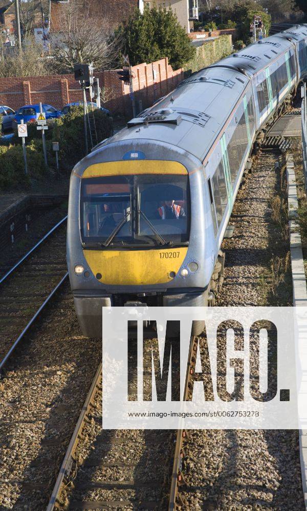 Class 170 turbostar diesel train on rail tracks, Woodbridge, Suffolk ...