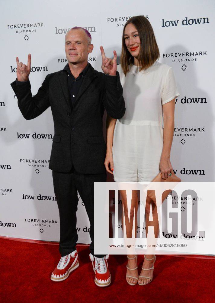 Cast member Flea and actress Sandha Khin attends the premiere of the ...