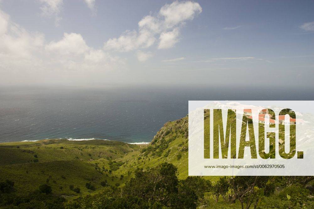 View of coastline and school buildings, The Bottom, Saba Island in the ...