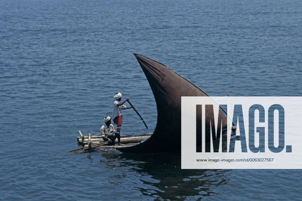 Local people sailing a dhow, a traditional sailing vessel