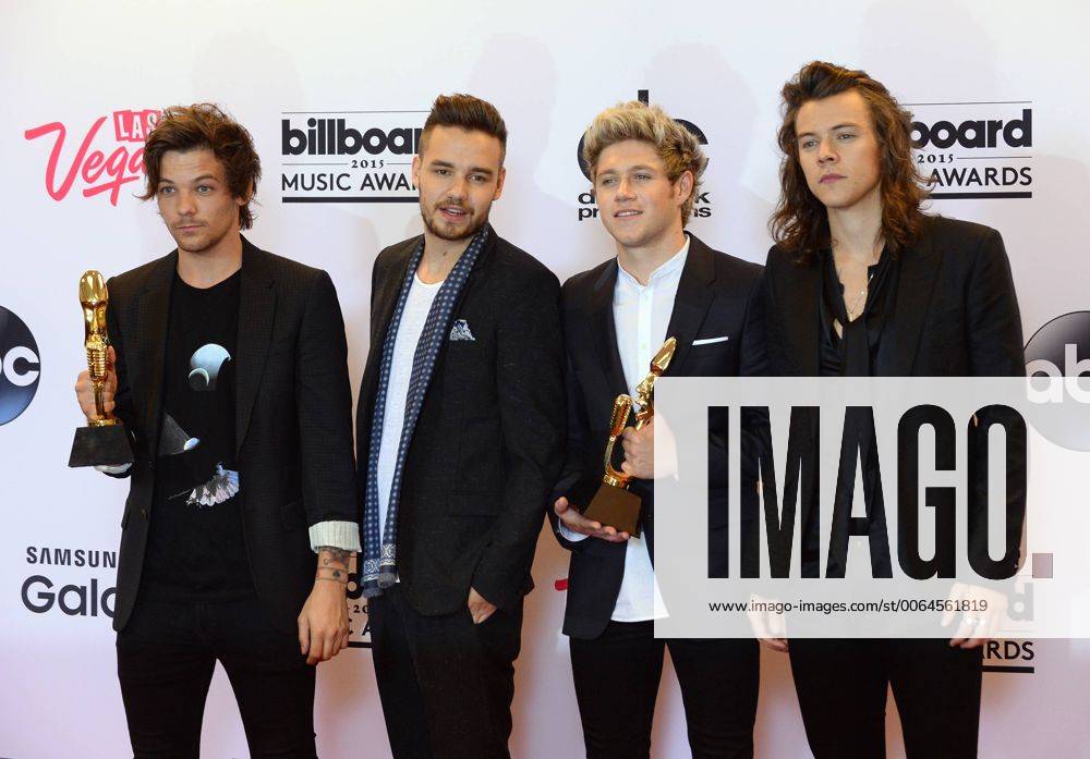 Musical group One Direction poses backstage with the awards for Top ...