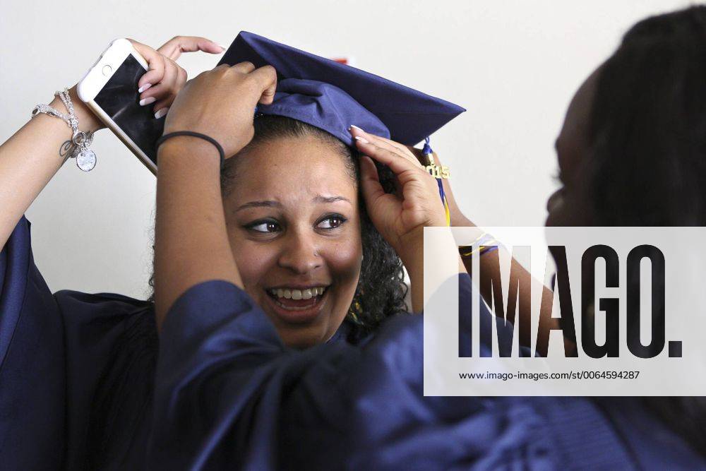Palm Beach County, Florida, U.S. - Samone Jansen, left, gets help ...
