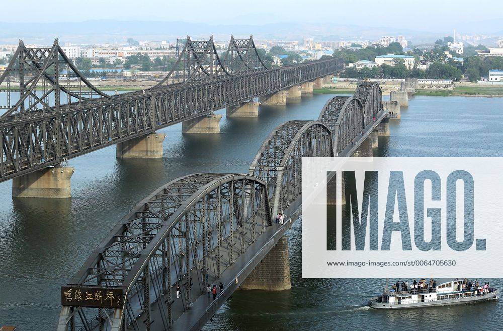 North Korean tourists visit the American bombed Yalu River Jiang Duan ...