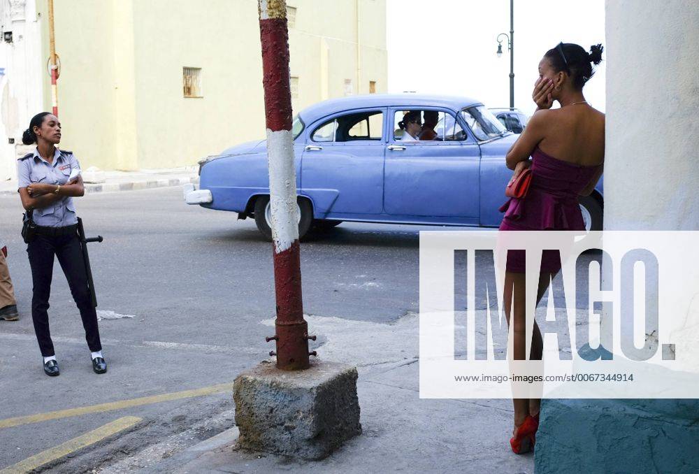 Oct. 29, 2015 - Havana, Cuba - A local police woman keeps her eye on a ...