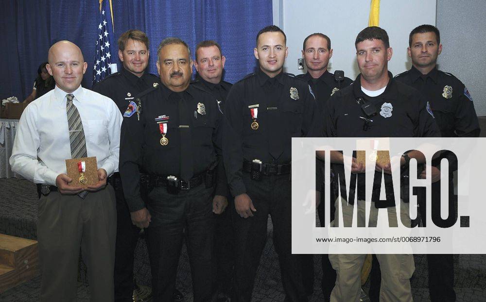 Albuquerque, NM, U.S. - left to right APD officers Travis Cochran, Mark ...
