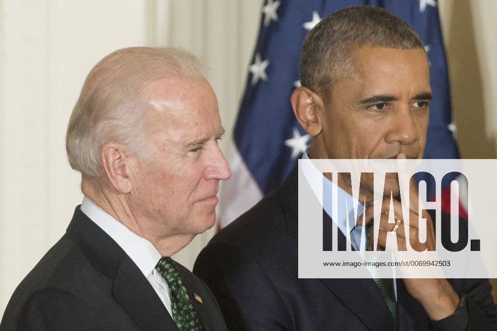 President Barack Obama and Vice President Joe Biden attend a reception ...