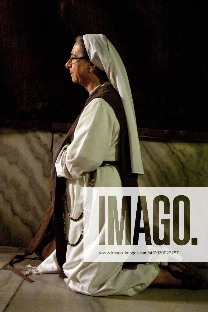 Dec. 19, 2011 - Bethlehem, ISR - A nun prays at the Church of the ...