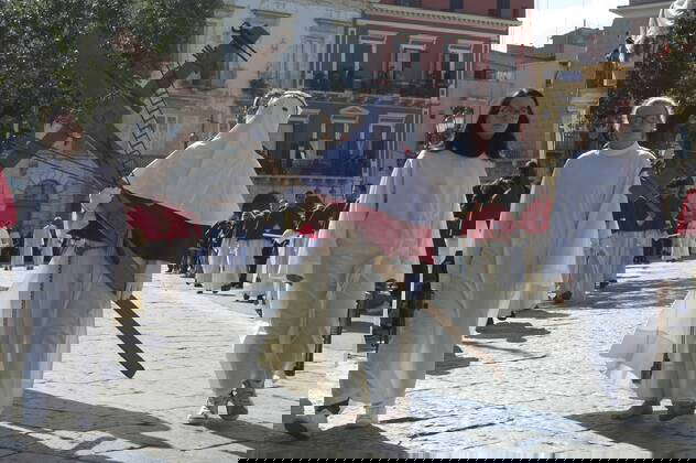 Italy: Good penitential procession in Barletta Penitents carries a ...