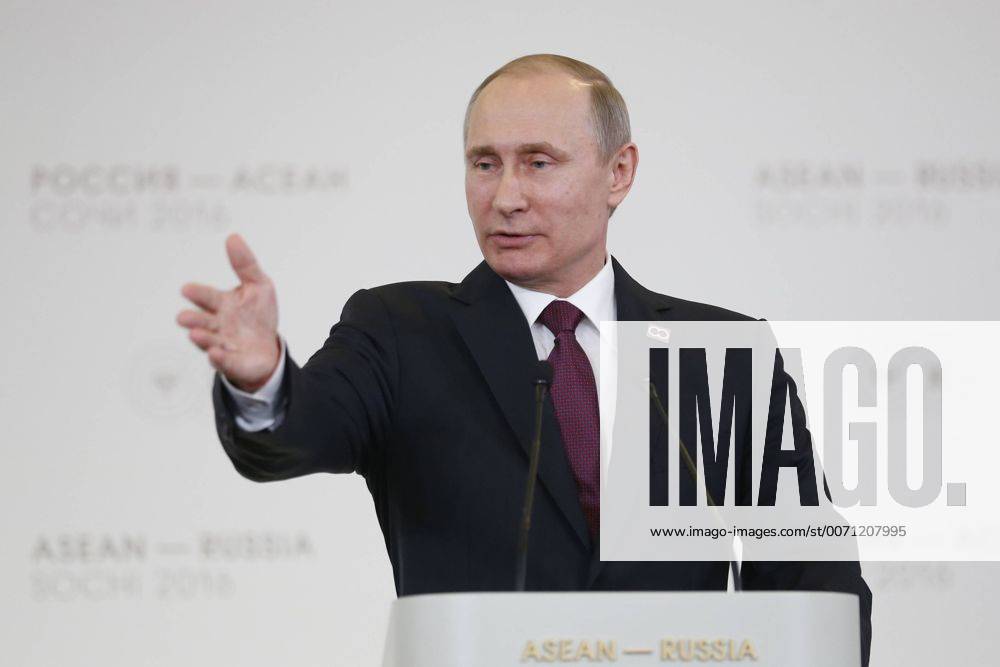 Russia s President Vladimir Putin gestures during a press conference ...