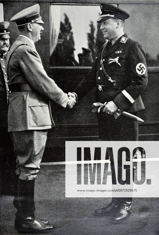 Adolf Hitler is met by Richard Walther Darré an SS-Obergruppenführer ...