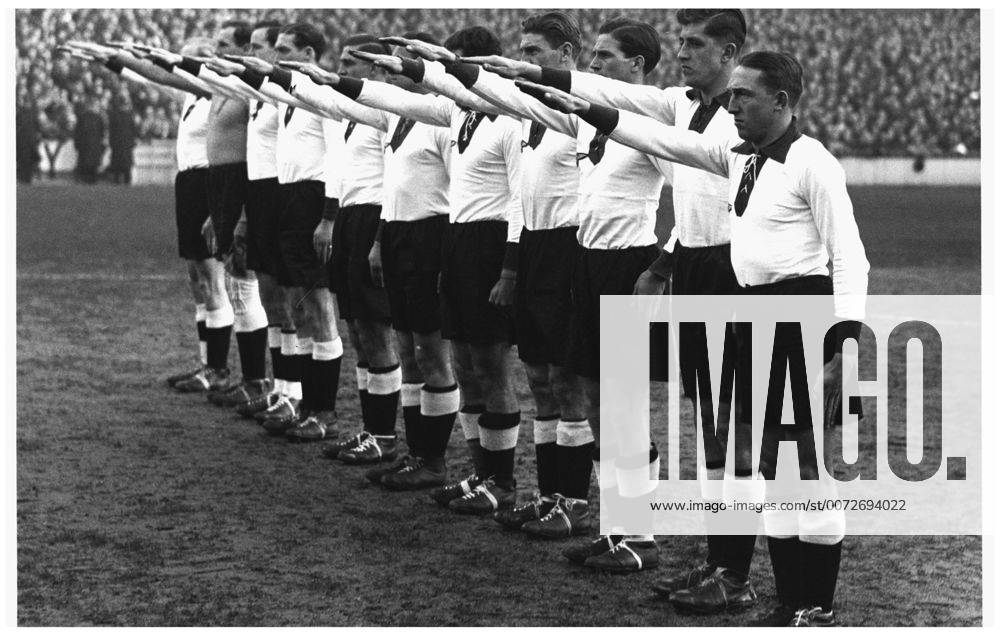 1936, Germany Versus England. German team give the Nazi salute at the ...