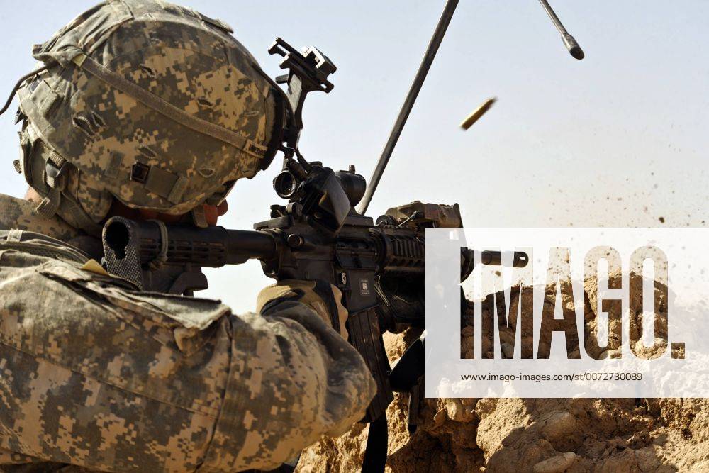 February 19, 2010 - U.S. Army soldier engages enemy forces in a small ...