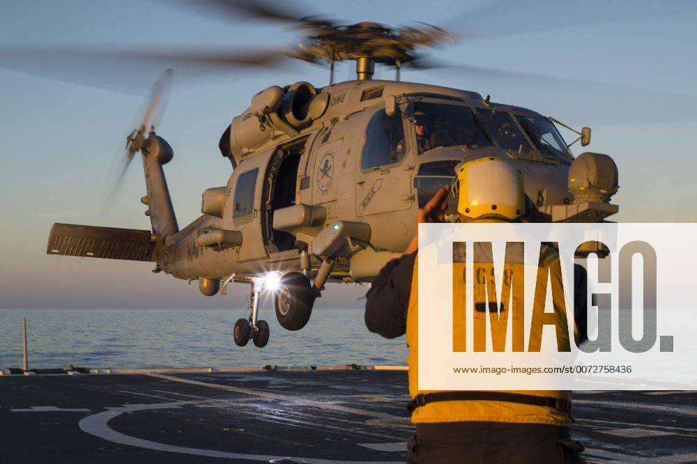 Atlantic Ocean, Boatswain s Mate guides in an MH-60R Sea Hawk ...
