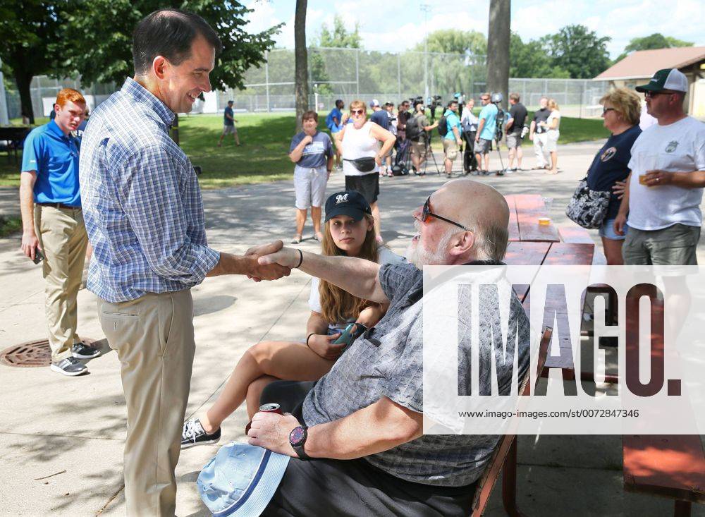 Milwaukee, WI, USA - Wisconsin Gov. Scott Walker shakes hands with ...