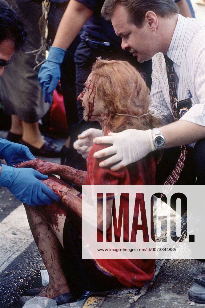 New York, New York, U.S. - Emergency workers help GIGI SINGER. Injured ...