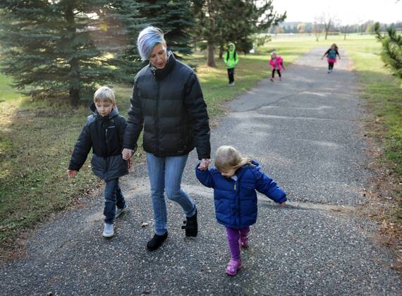 Dayton, MN, USA - Malina Hruby with her 2-year-old daughter leaves ...