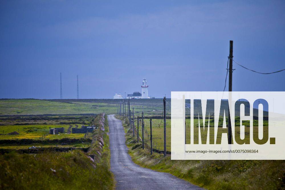Open road to Loop Head lighthouse at the end of the Loop peninsula ...