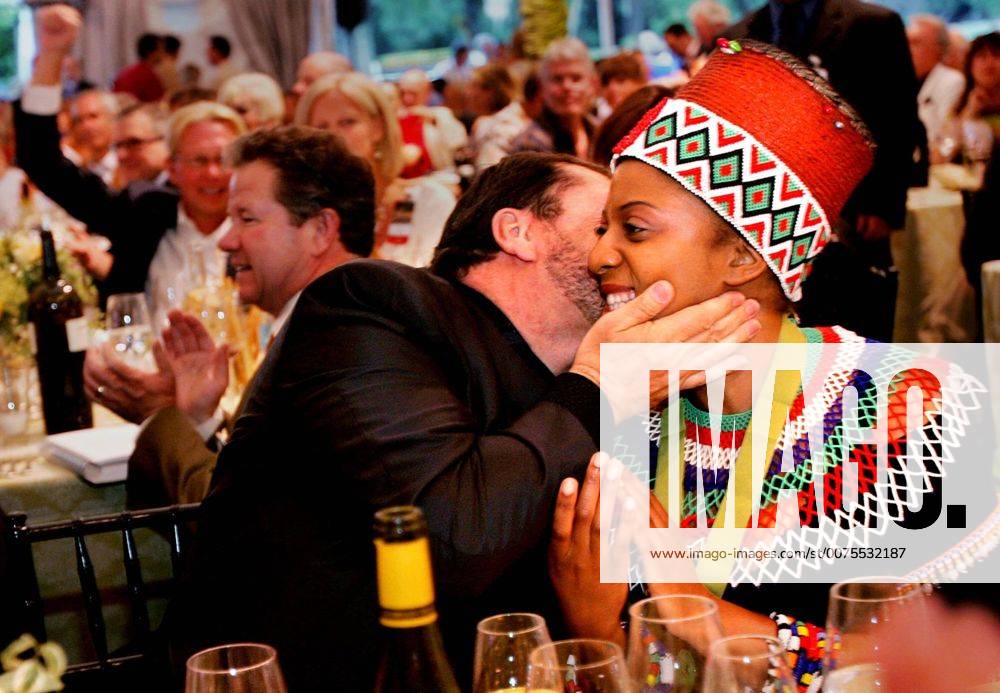 Jose Luis Nazar, of Los Angeles, leans over and kisses the Royal ...