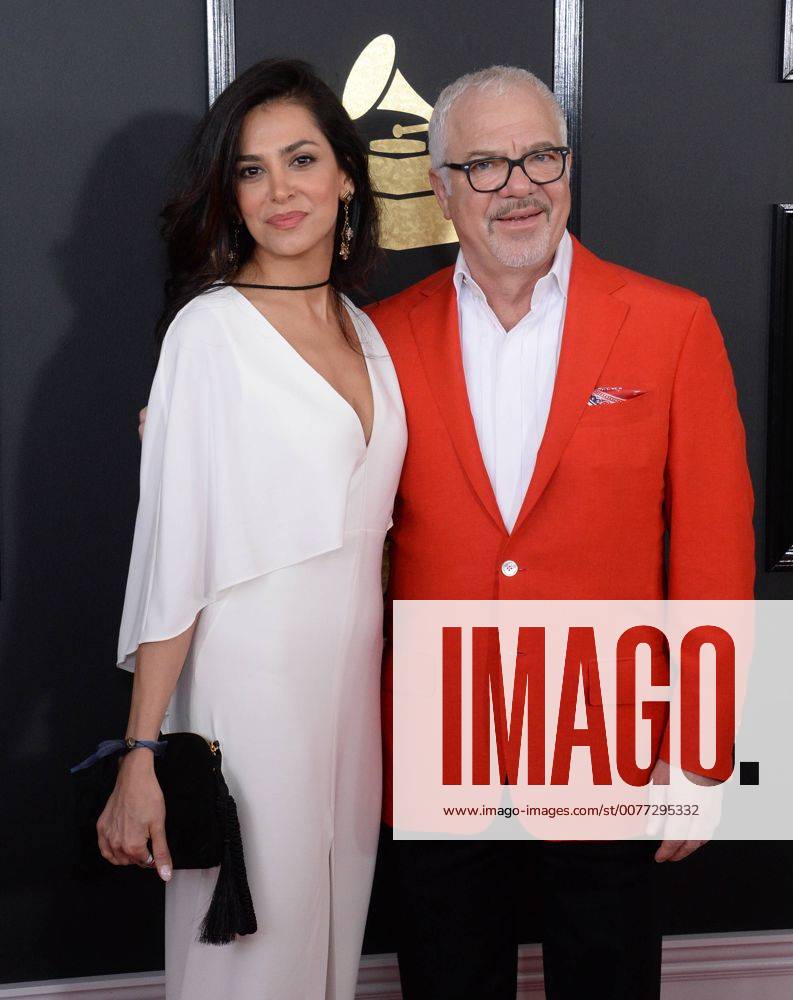 Paradigm Talent Agency chairman Sam Gores and guest arrive for the 59th ...