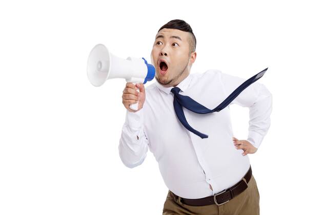 The fat man with a megaphone shouting business