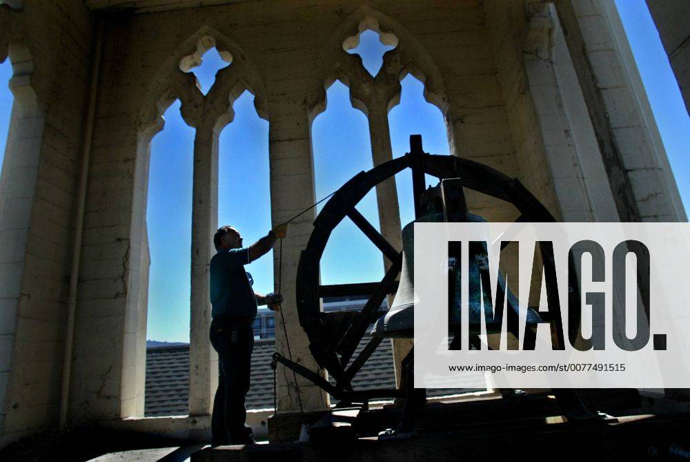 Michael Borg the bell restoration worker does one last check on the old ...