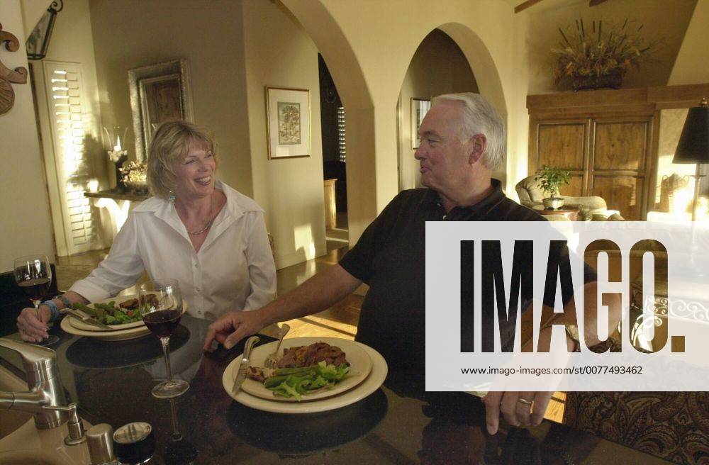 Jennifer Bulotti left, and Jim Bulotti right, enjoy their dinner and ...