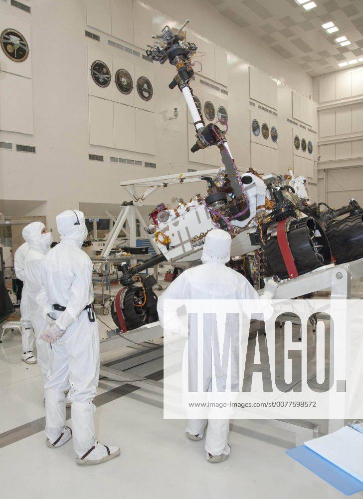 NASA s next Mars rover, Curiosity, stretches its robotic arm upward ...