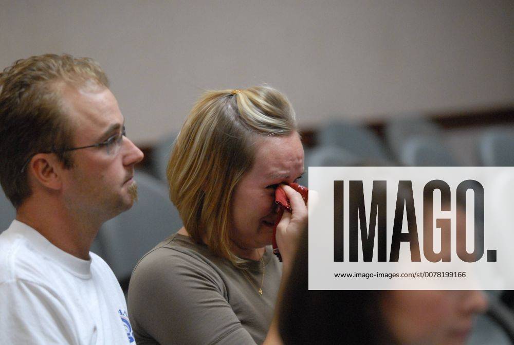 Ron Presba s daughter Misti Presba wipes away tears as Patty Presba ...