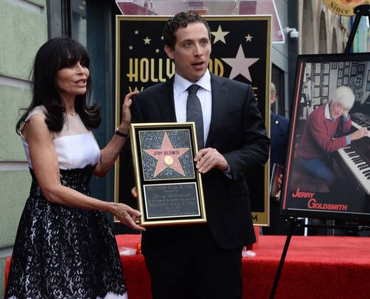 Carol Goldsmith (L) and Aaron Goldsmith, the wife and son of Oscar ...