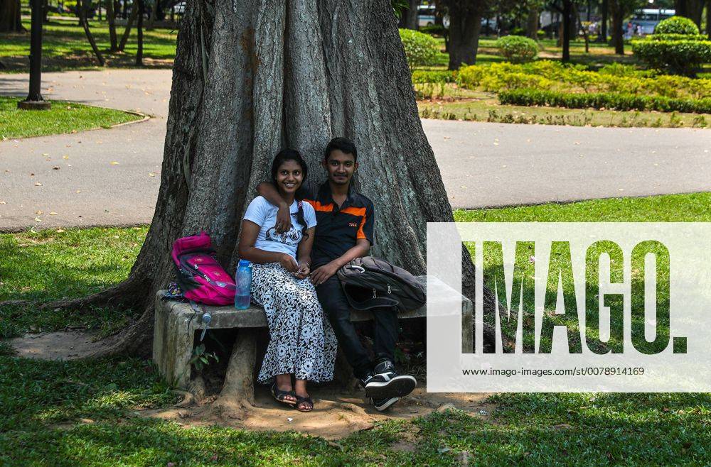 COLOMBO, SRI LANKA - : A couple in Viharamahadevi Park. Valery Sharifulin TASS